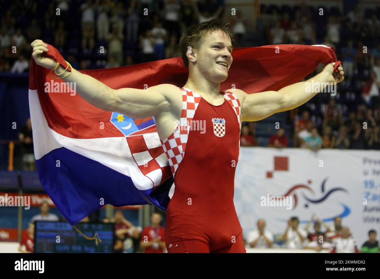 Zagreb, Croatia: Dominik Etlinger (in red) from Croatia celebrates with ...
