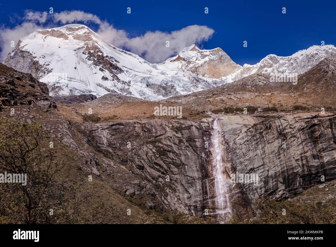 Waterfall and Huascaran massif in Cordillera Blanca, snowcapped Andes ...