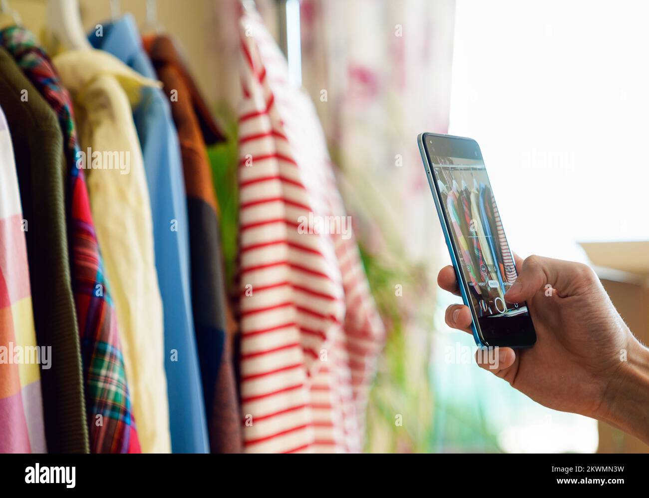 Pre owned clothes resale or donation Stock Photo - Alamy