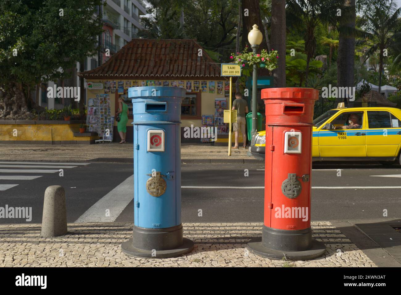 Funchal, Madeira - street scene with red and blue post boxes, zebra ...