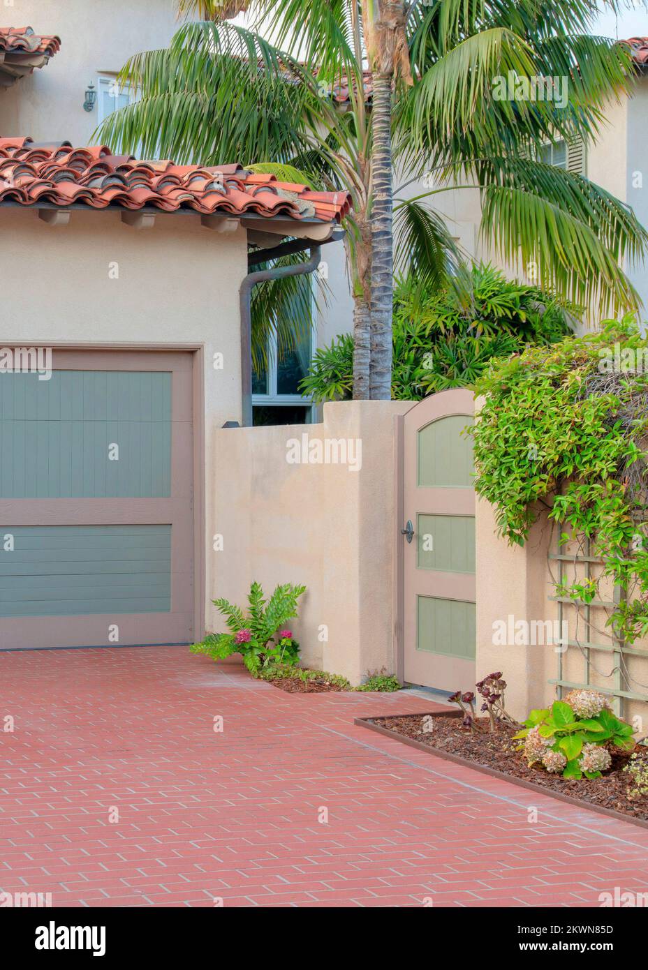 Vertical Garage exterior with red bricks driveway at La Jolla ...