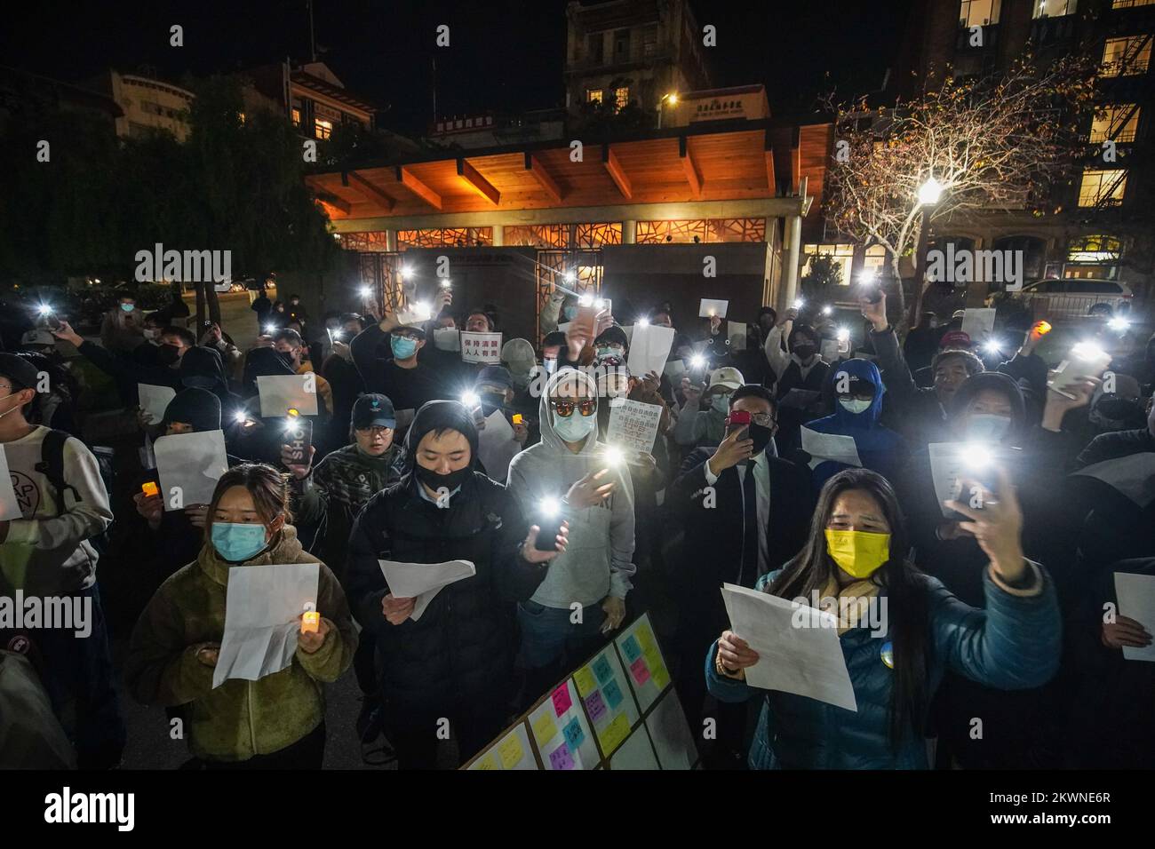 San Francisco, United States. 29th Nov, 2022. Protesters hold up their ...