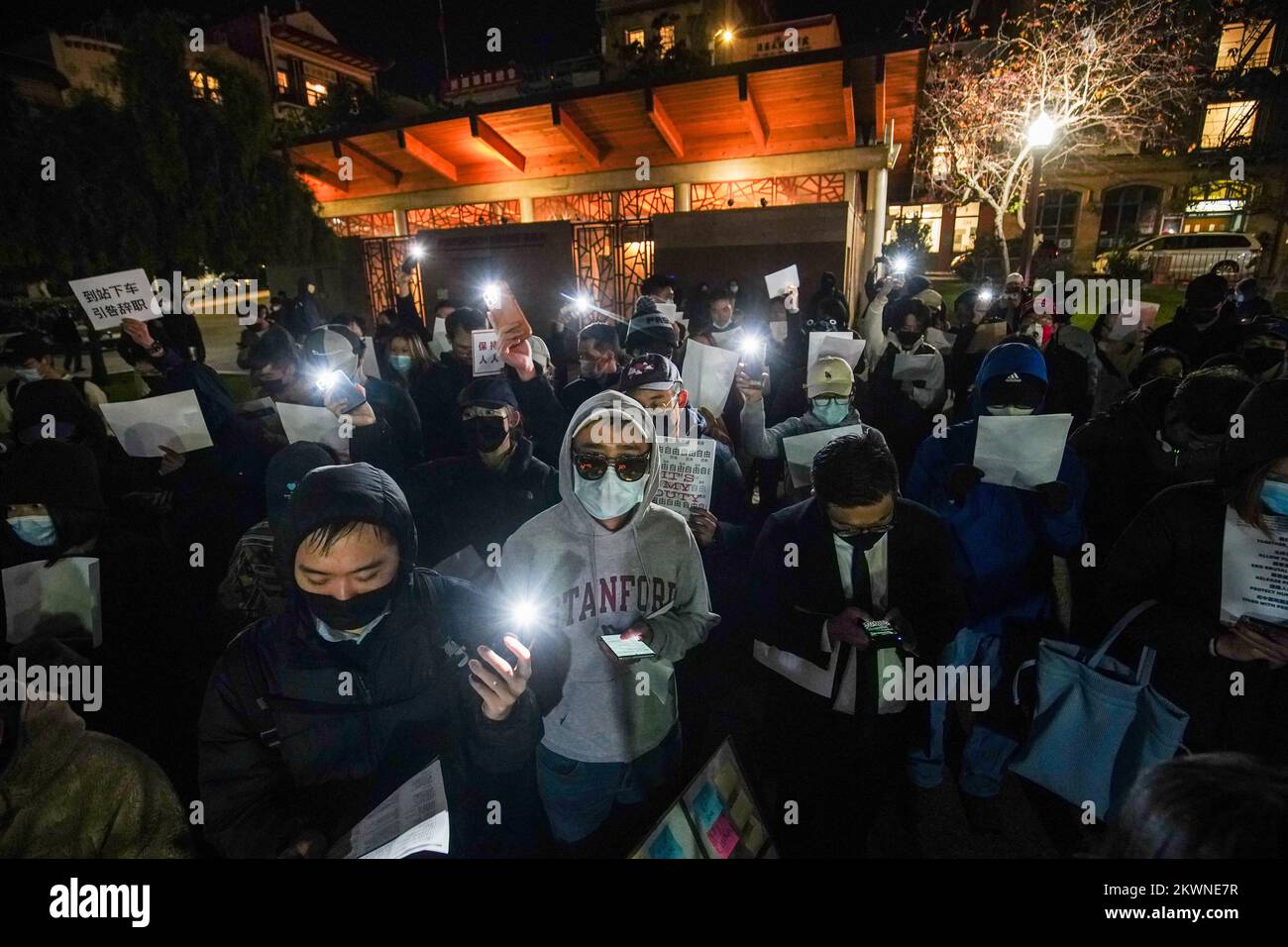 San Francisco, United States. 29th Nov, 2022. Protesters hold up their ...