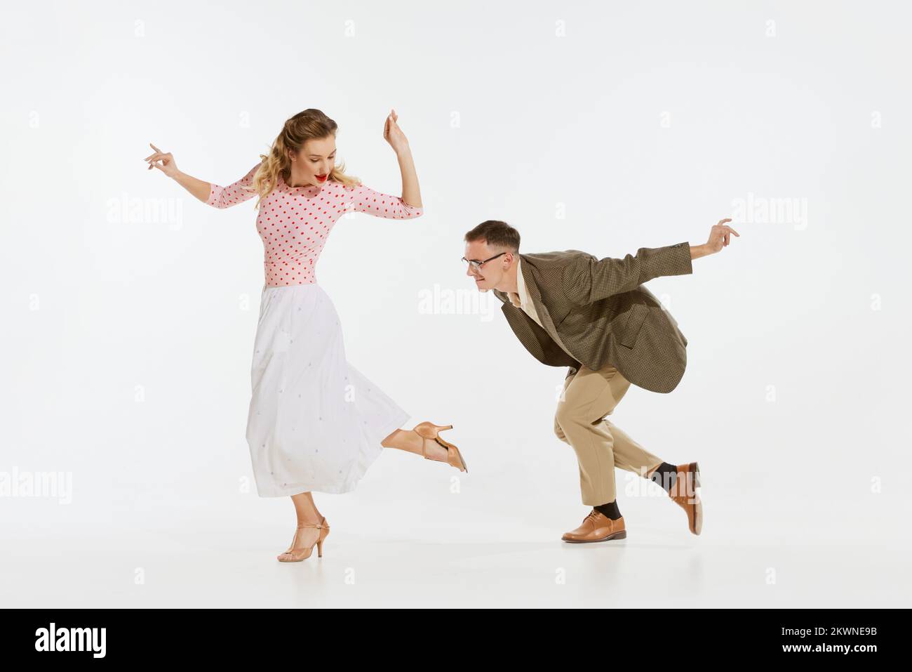 Dynamic portrait of happy, stylish and energetic dancers dancing lindy ...