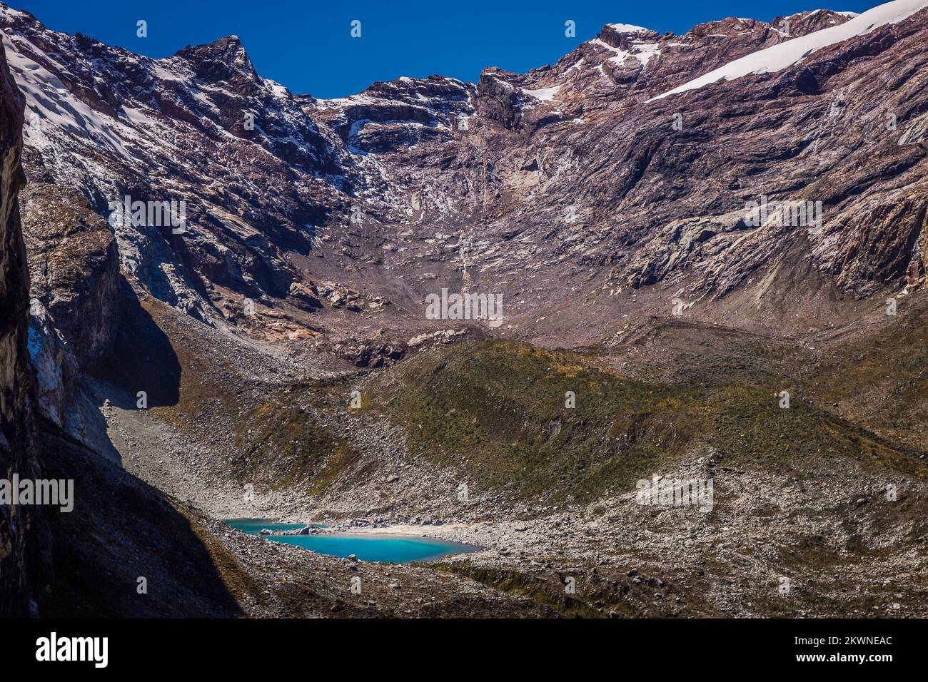 Secluded lake in Cordillera Blanca, snowcapped Andes, Ancash, Peru ...