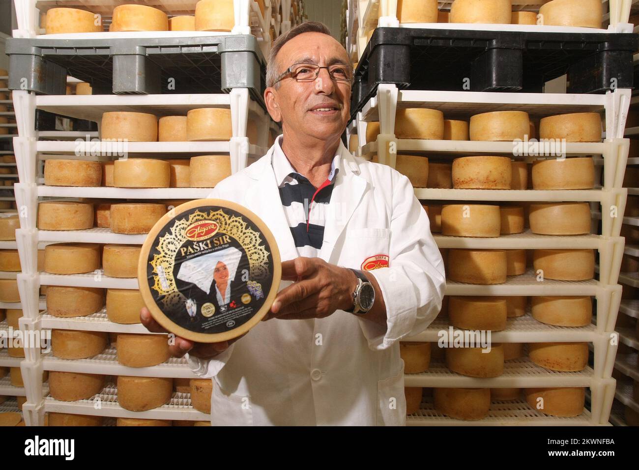 14.08.2013., Kolan, island Pag , Croatia - Ivan Gligora and and his son ...