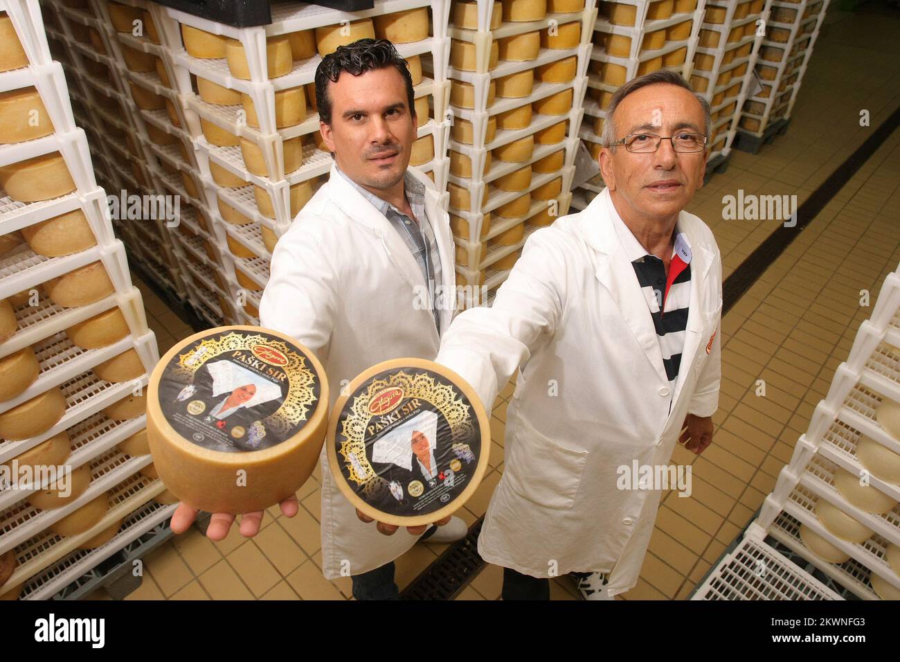 14.08.2013., Kolan, island Pag , Croatia - Ivan Gligora and and his son ...