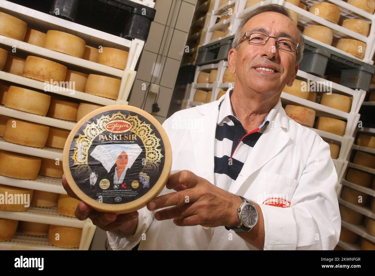 14.08.2013., Kolan, island Pag , Croatia - Ivan Gligora and and his son ...