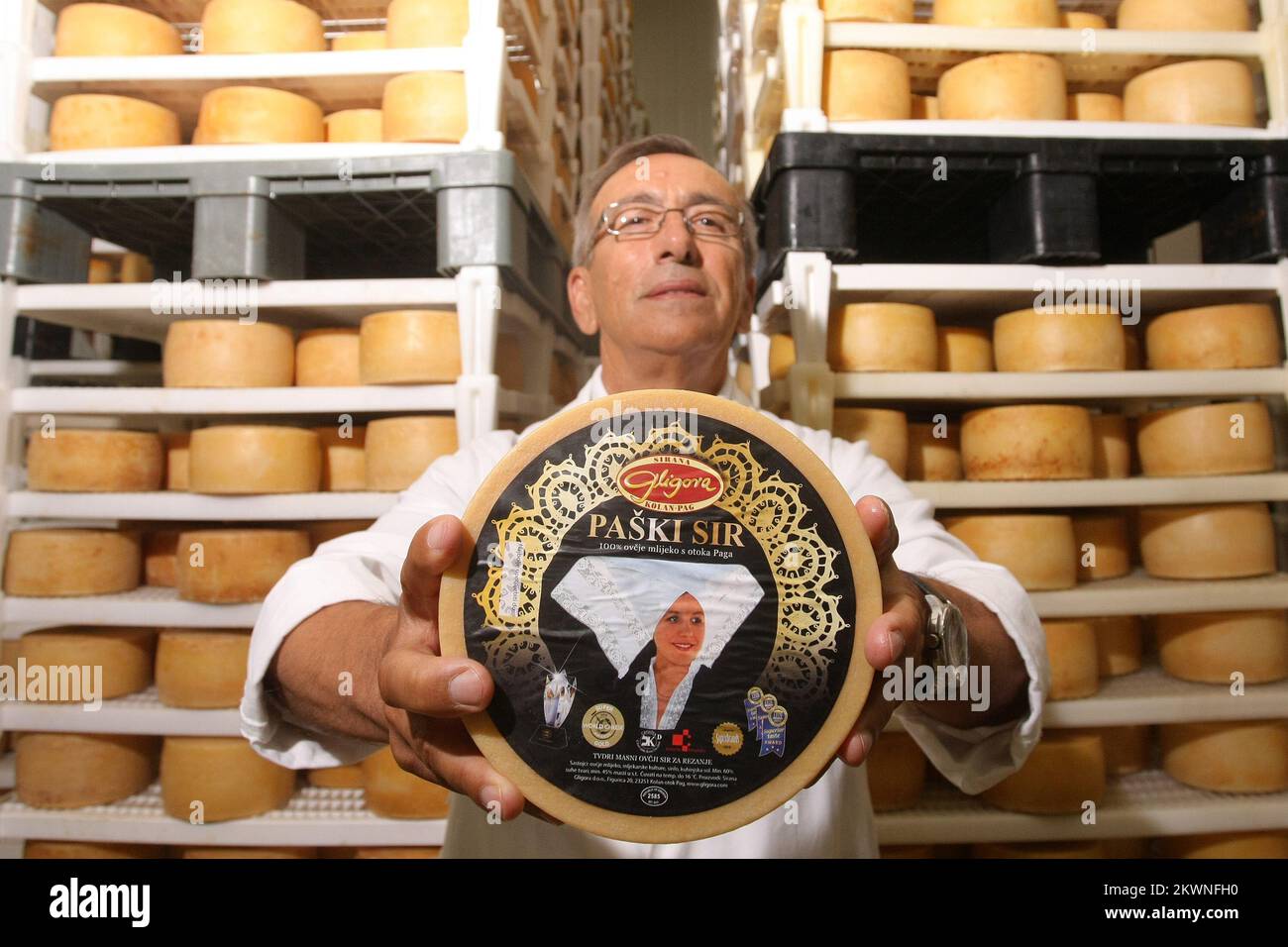 14.08.2013., Kolan, island Pag , Croatia - Ivan Gligora and and his son ...