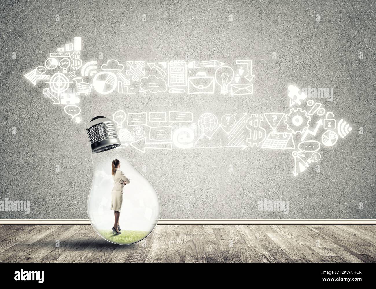 Businesswoman trapped in bulb Stock Photo - Alamy