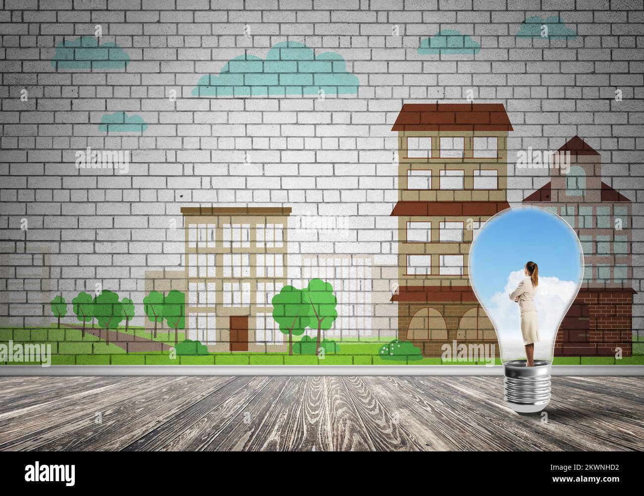 Businesswoman trapped in bulb Stock Photo - Alamy