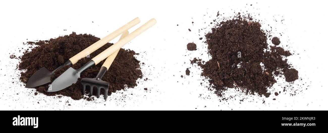 garden tools in soil isolated on white background Stock Photo - Alamy