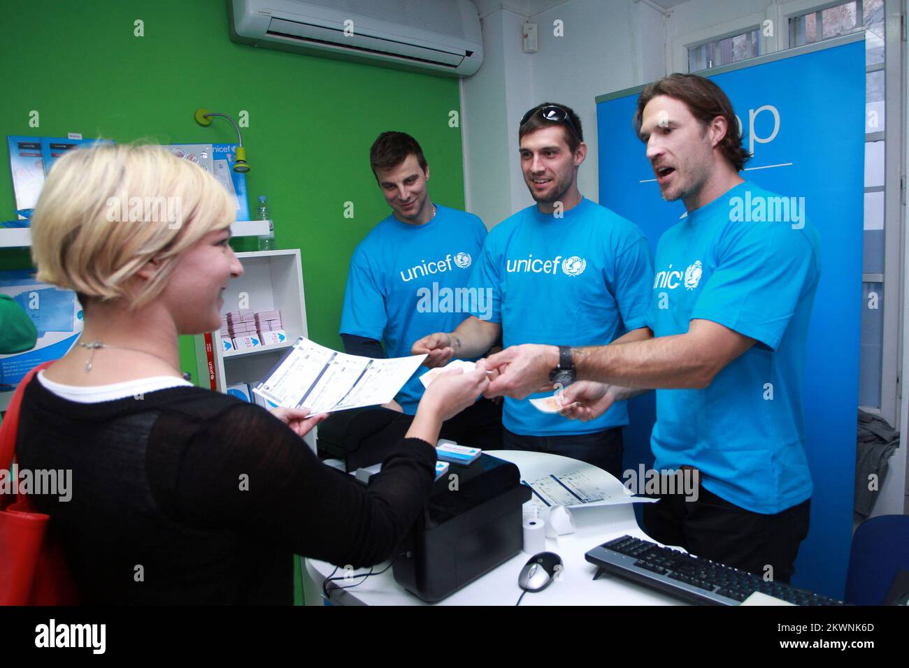 02.09.2013., Zagreb - UNICEF store.Ice hockey players of Medvescak sell ...