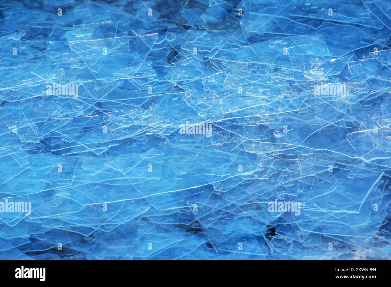 Ice surface of the river. Texture of ice shards. Winter background ...