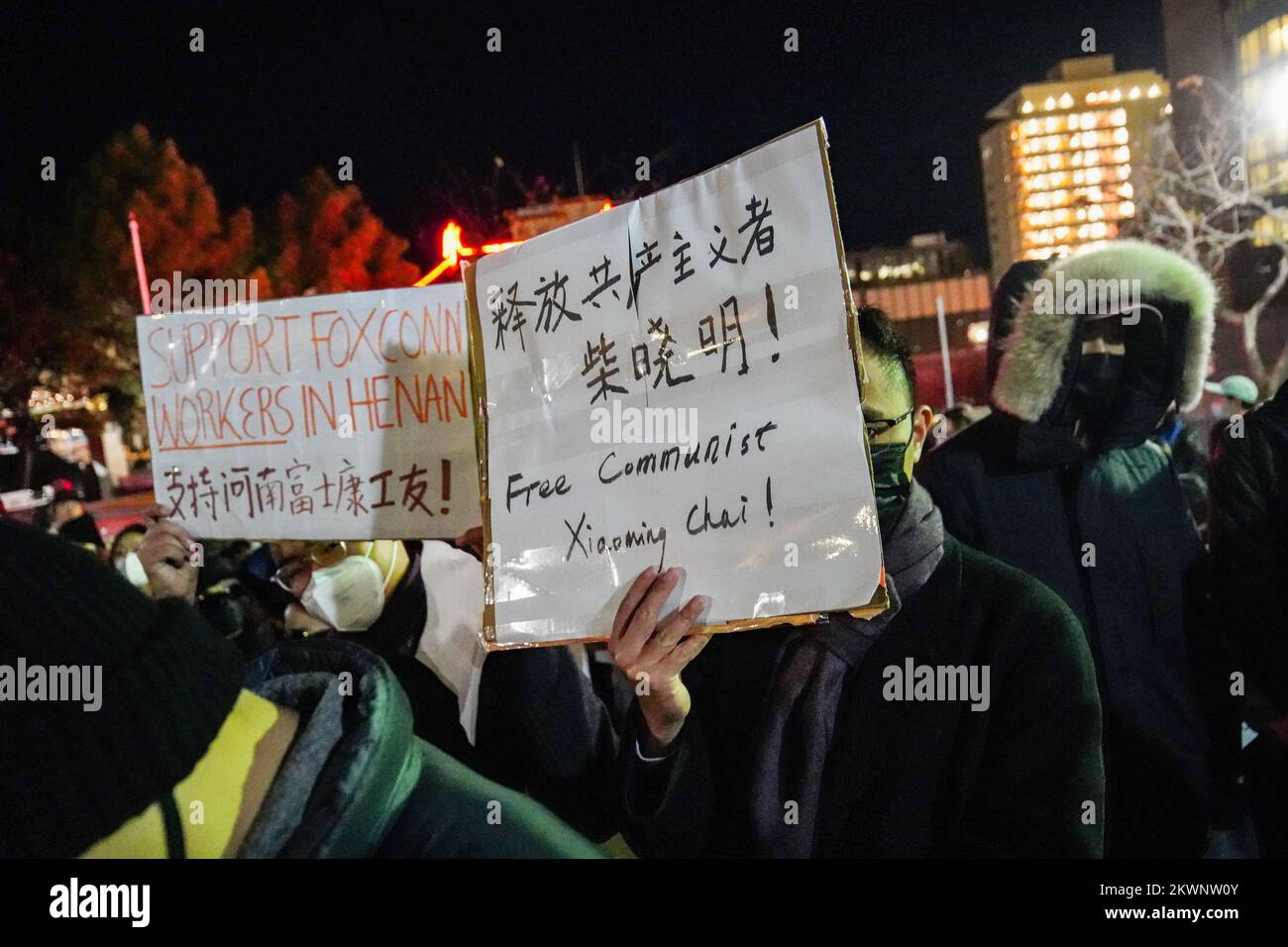 Protesters hold placards expressing their opinion during the ...