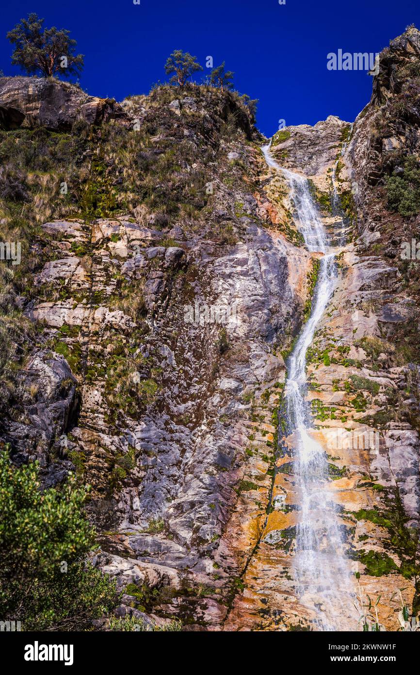 Waterfall and Huascaran massif in Cordillera Blanca, snowcapped Andes ...