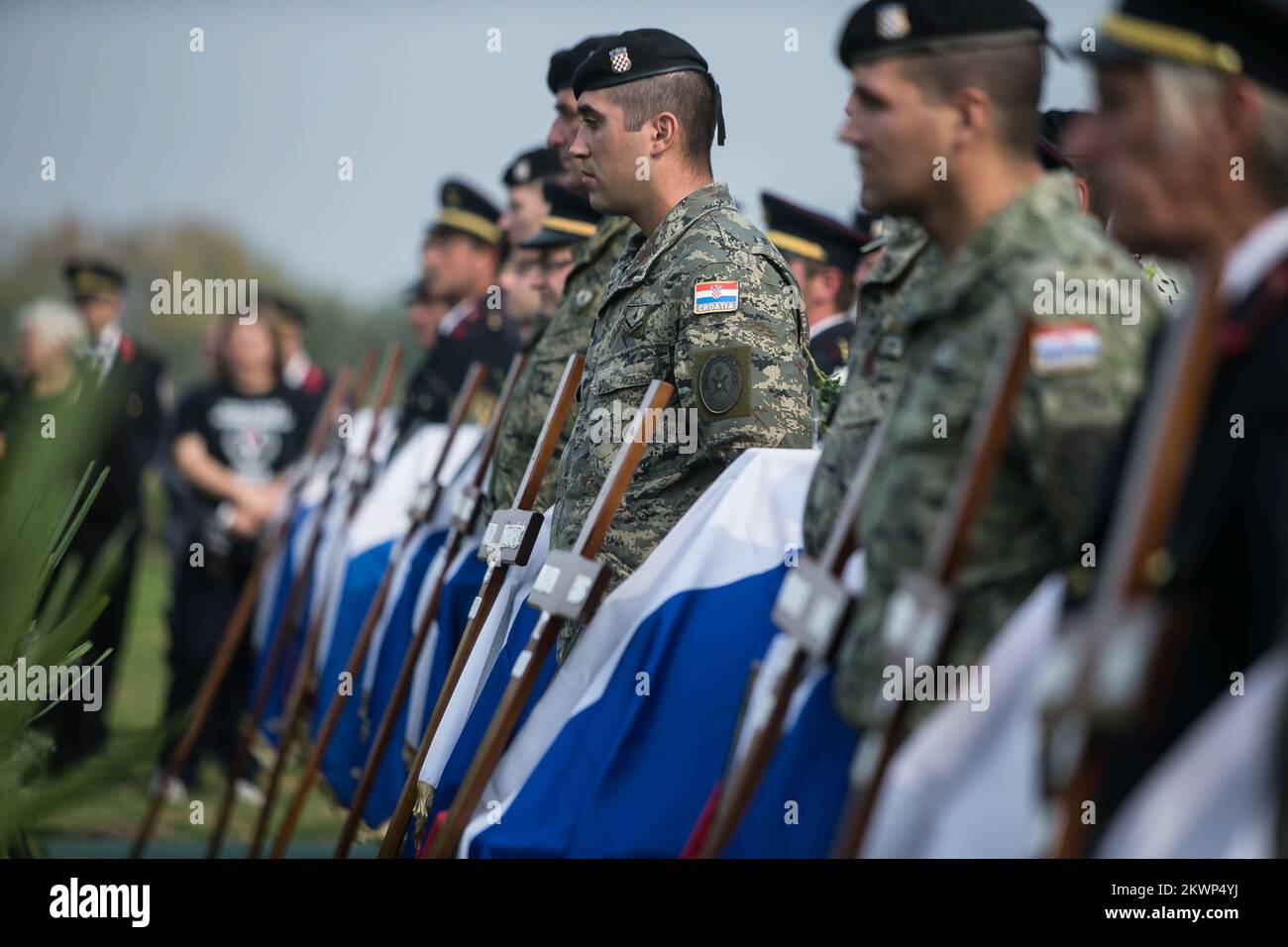14.10.2013., Sotin, Croatia - Joint funerals of body remains of four ...