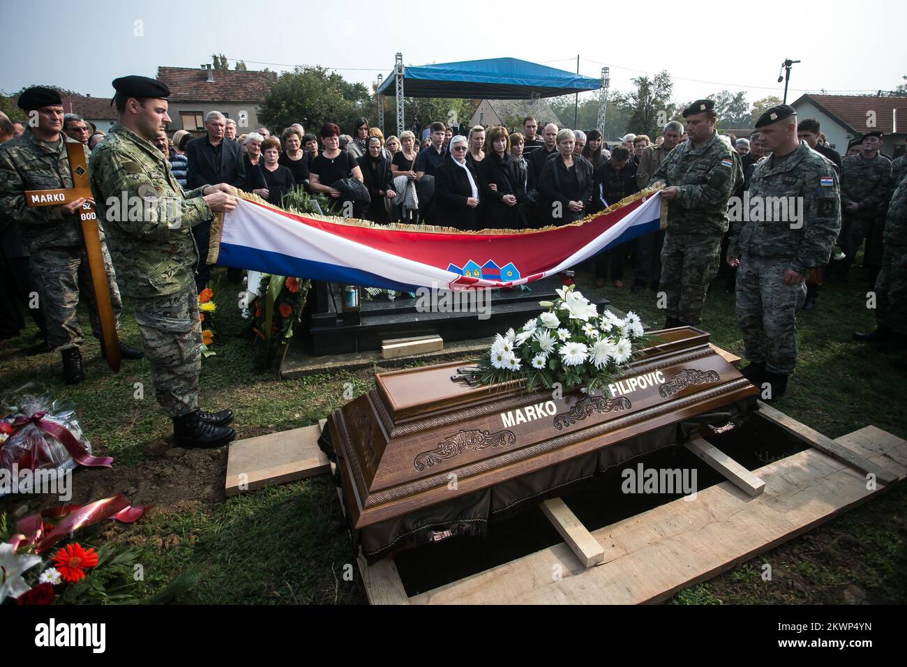 14.10.2013., Sotin, Croatia - Joint funerals of body remains of four ...