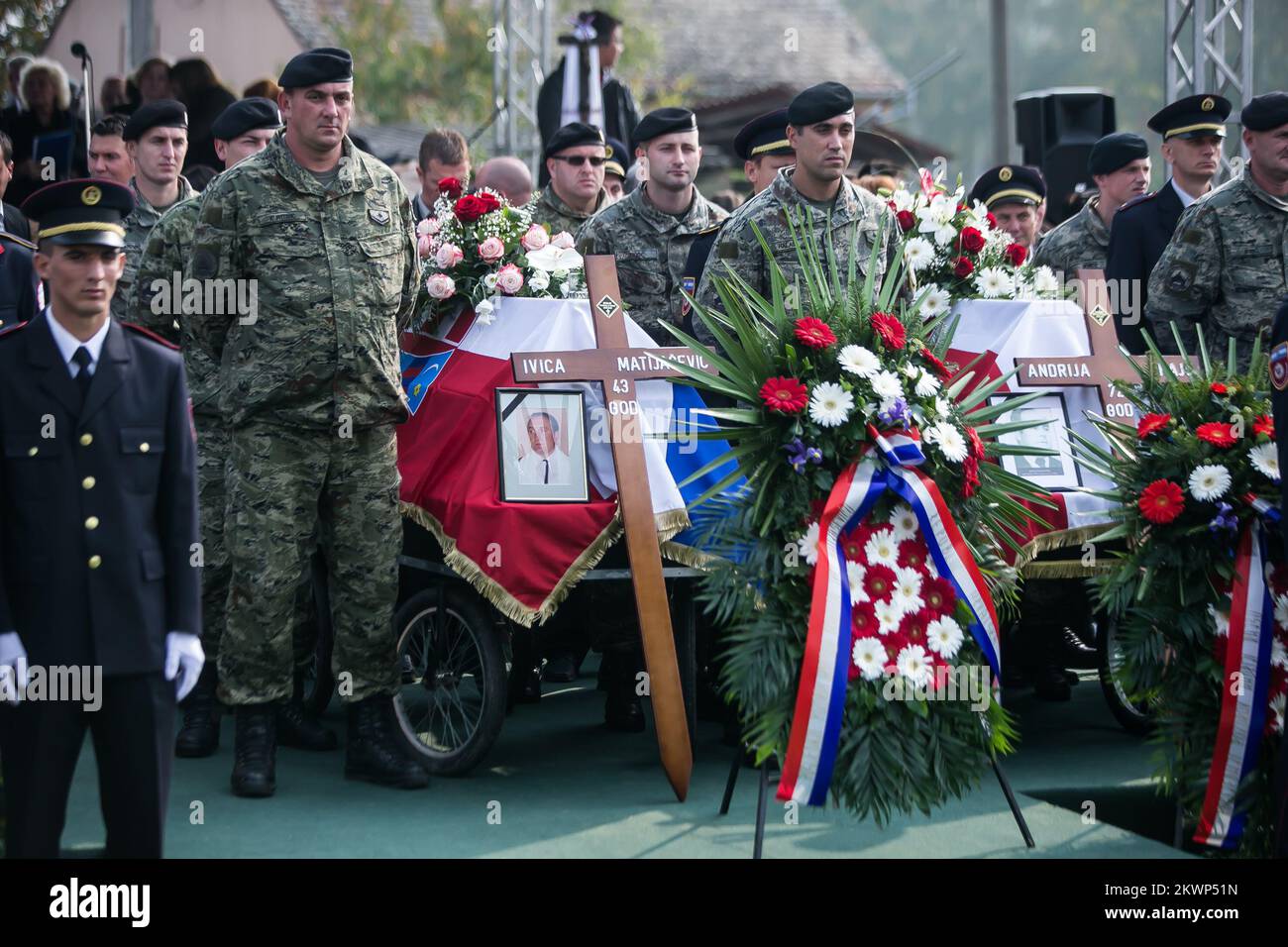 14.10.2013., Sotin, Croatia - Joint funerals of body remains of four ...