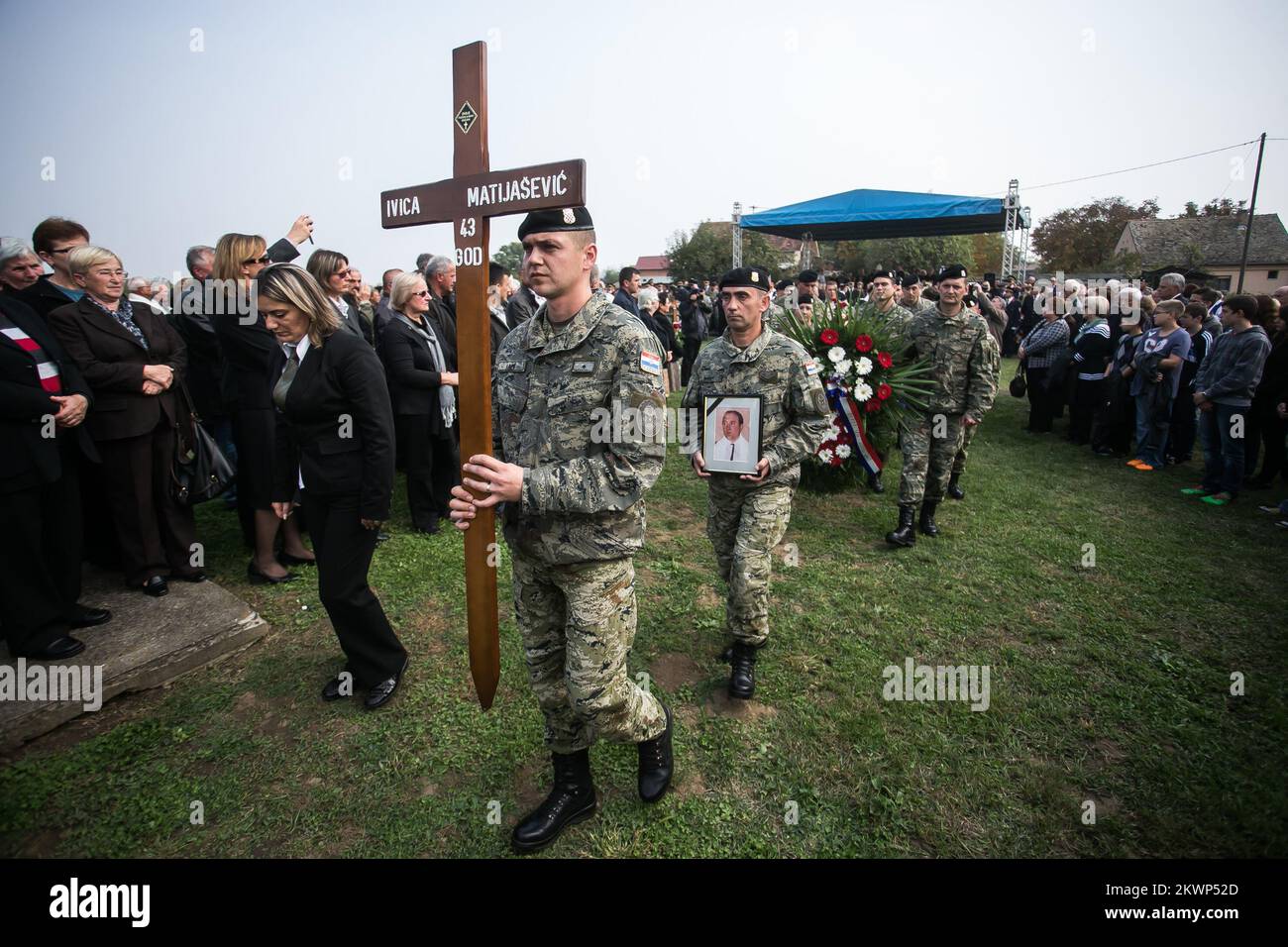 14.10.2013., Sotin, Croatia - Joint funerals of body remains of four ...