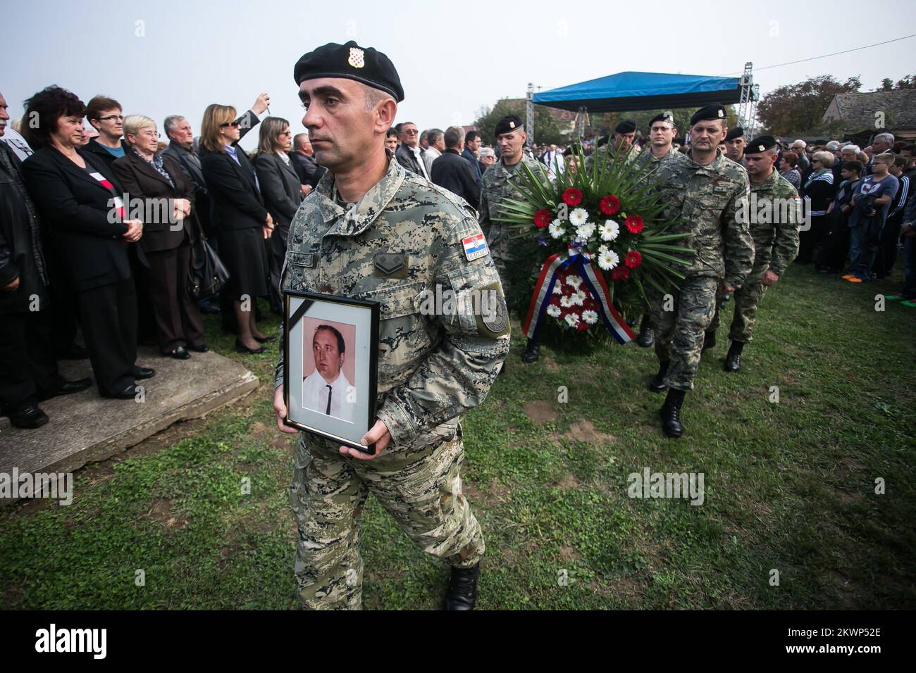 14.10.2013., Sotin, Croatia - Joint funerals of body remains of four ...