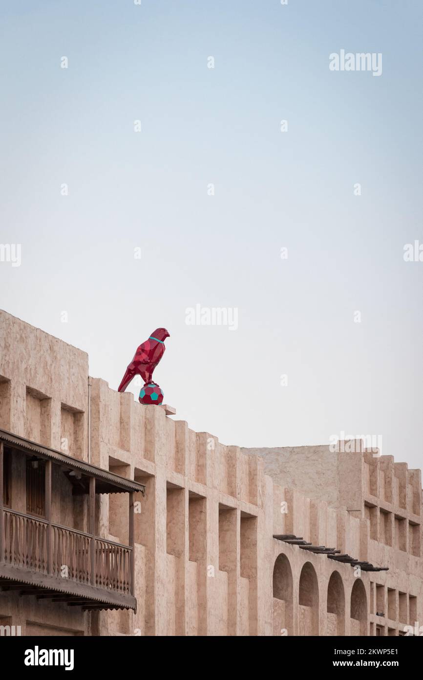 Red falcon sculpture in Doha, Qatar Stock Photo - Alamy