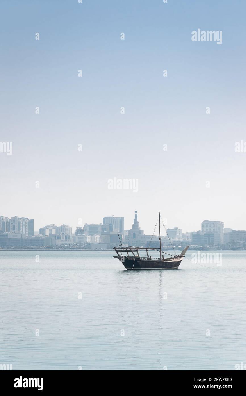 Traditional dhow boat docked in Doha, Qatar Stock Photo - Alamy
