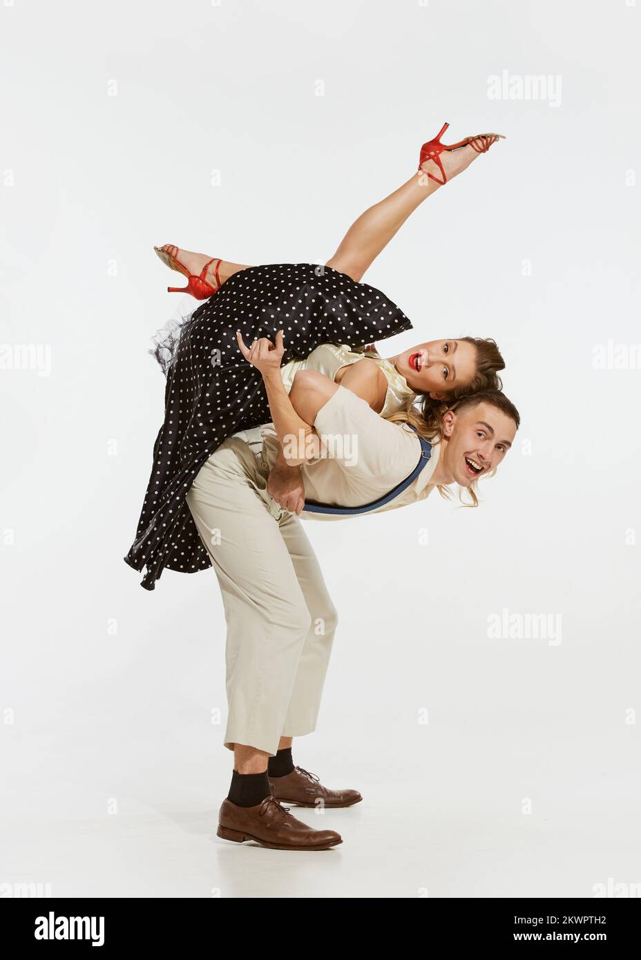 Happy, expressive professional dancers in 60s american fashion style ...