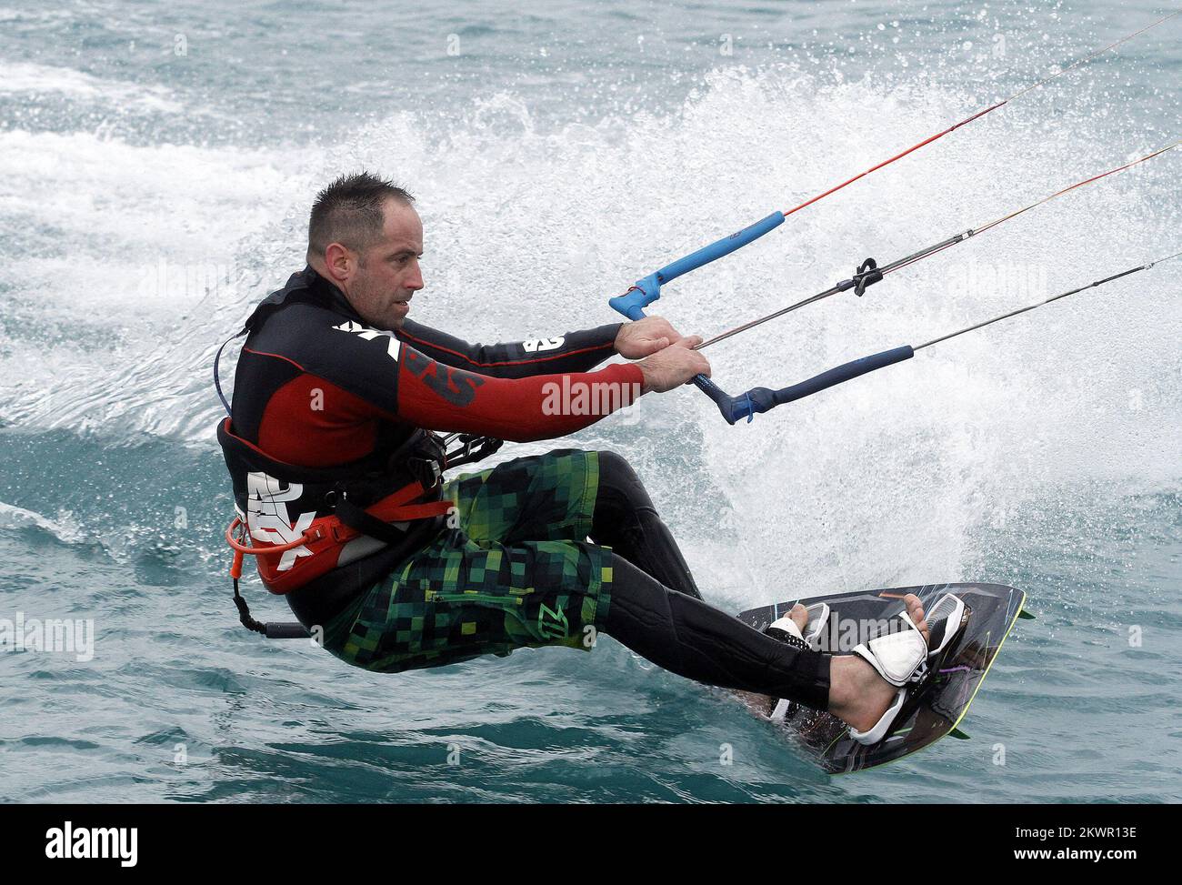 17.01.2014., Split, Croatia - Surfers and kite surfing enthusiasts have ...