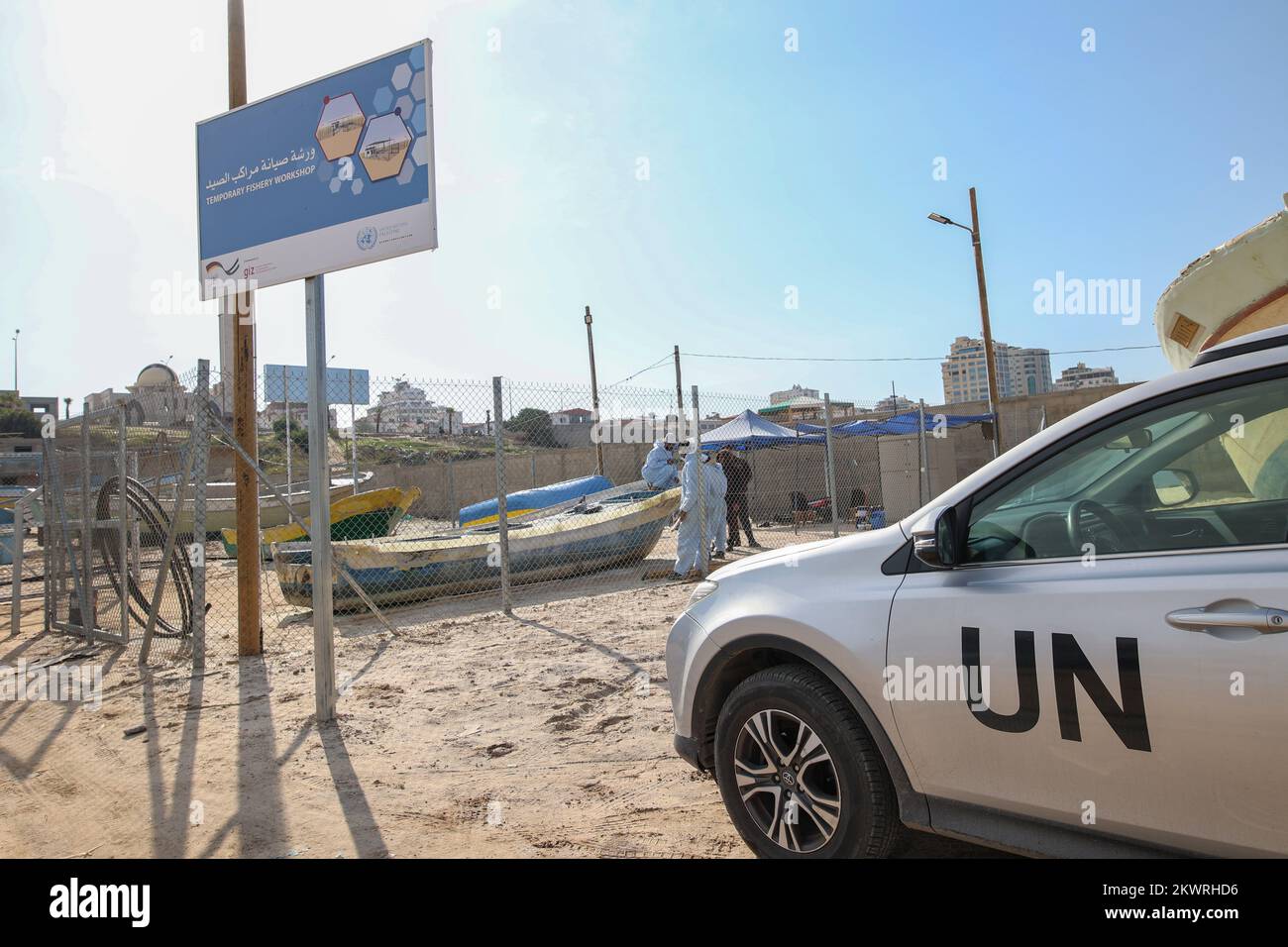 A UN car stops next to Palestinian workshop supervised by the United ...
