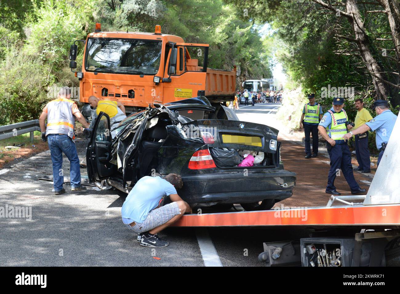 EDITOR'S NOTE - NUMBERPLATE OBSCURED - Three members of a British ...