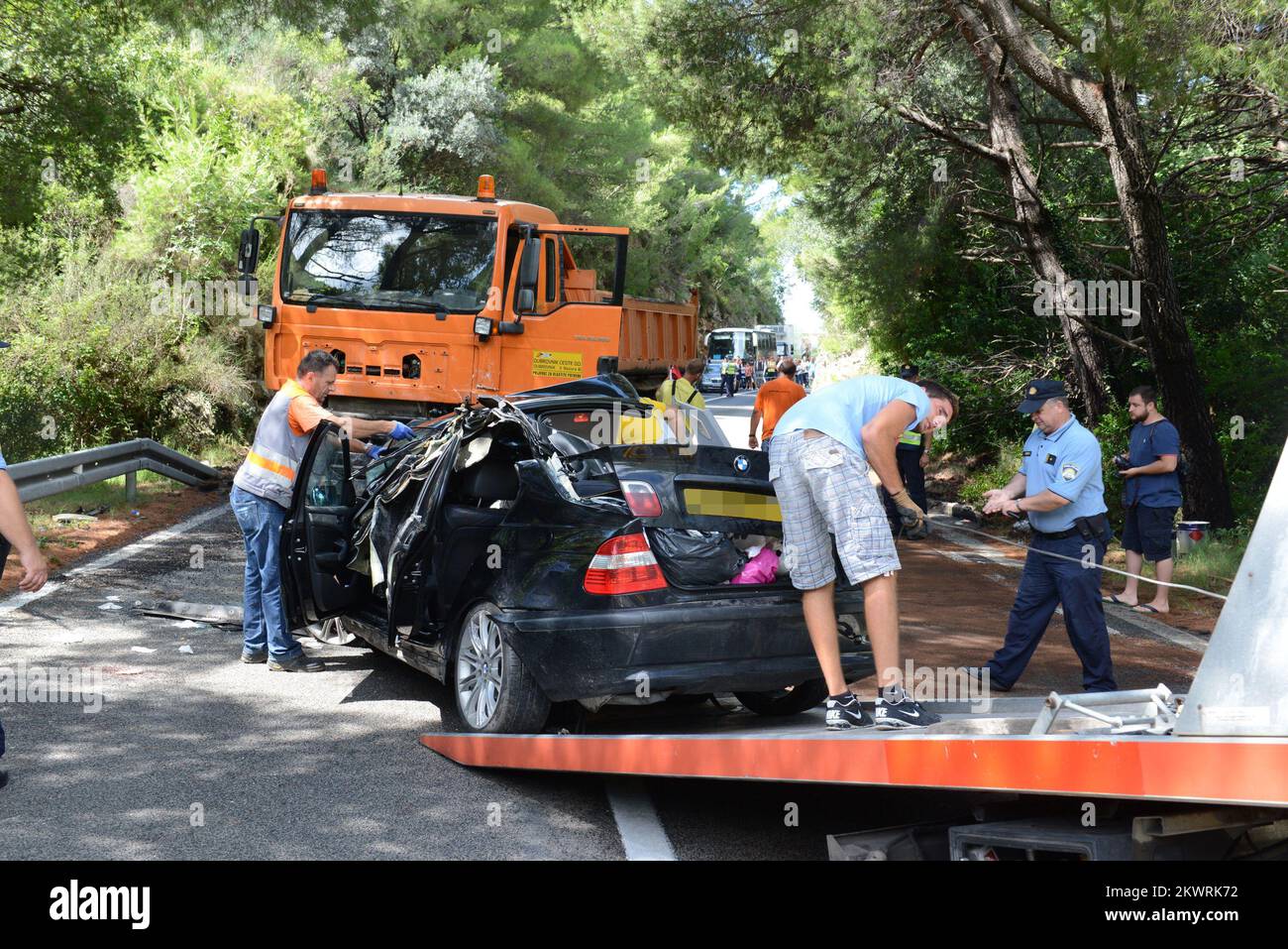 EDITOR'S NOTE - NUMBERPLATE OBSCURED - Three members of a British ...
