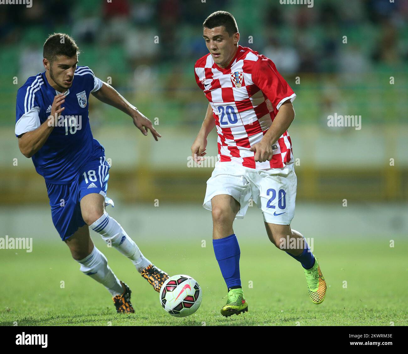 Cyprus's Kostakis Artymatas (left) and Croatia's Mateo Kovacic (right ...