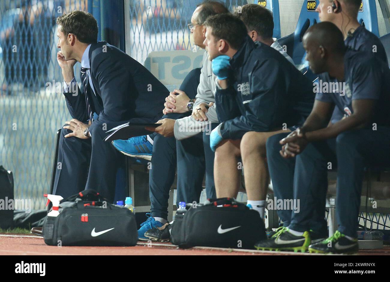 England manager Gareth Southgate (left) with his staff on the bench ...