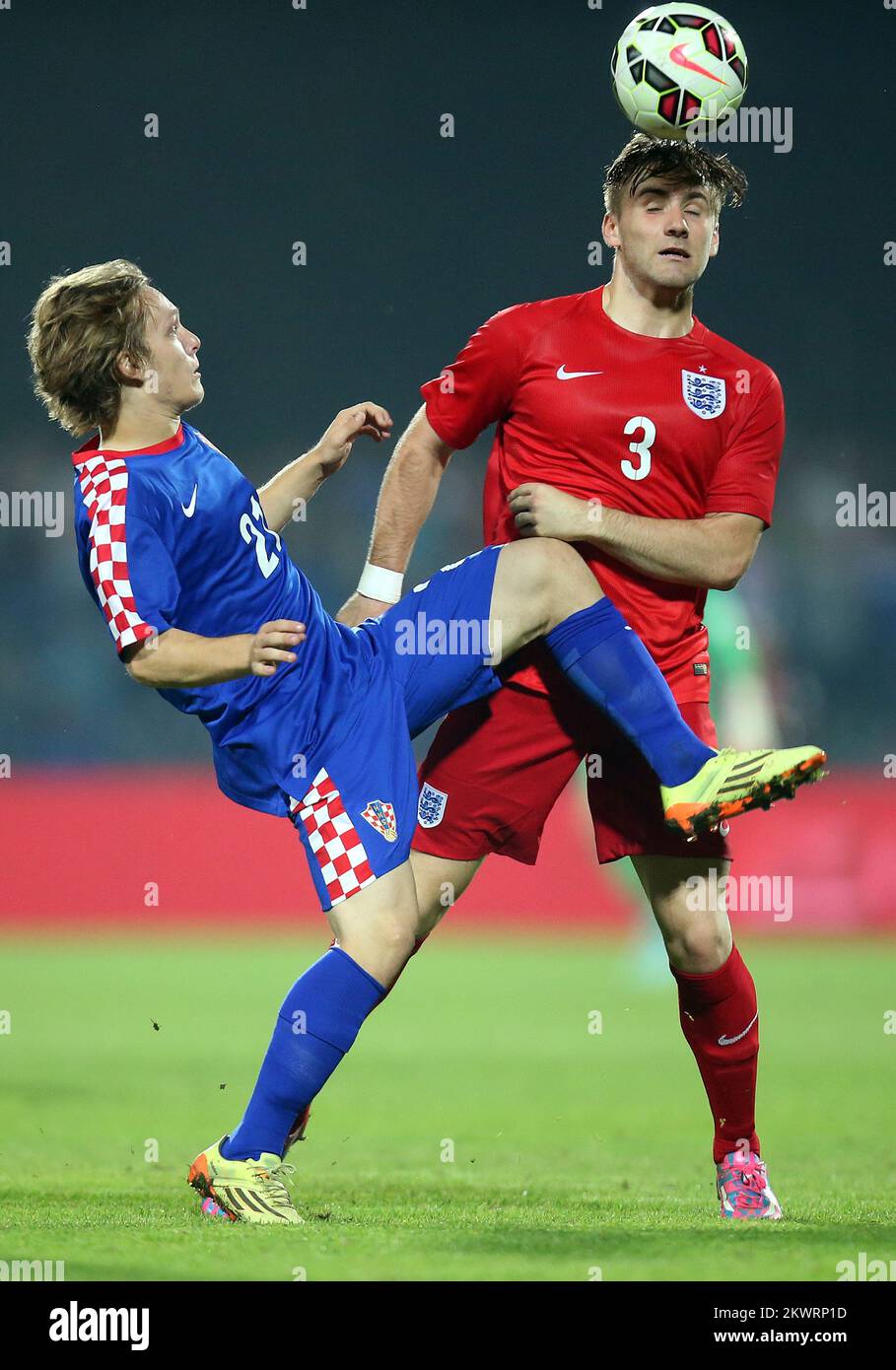 Croatia's Alen Halilovic (left) and England's Luke Shaw battle for the ...