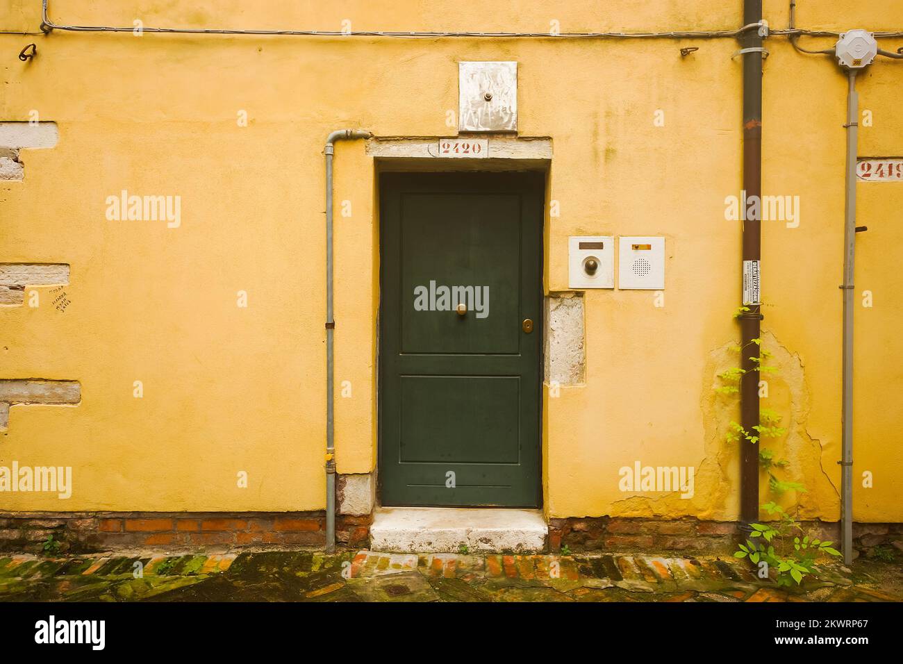 Facade of house with closed door Stock Photo - Alamy