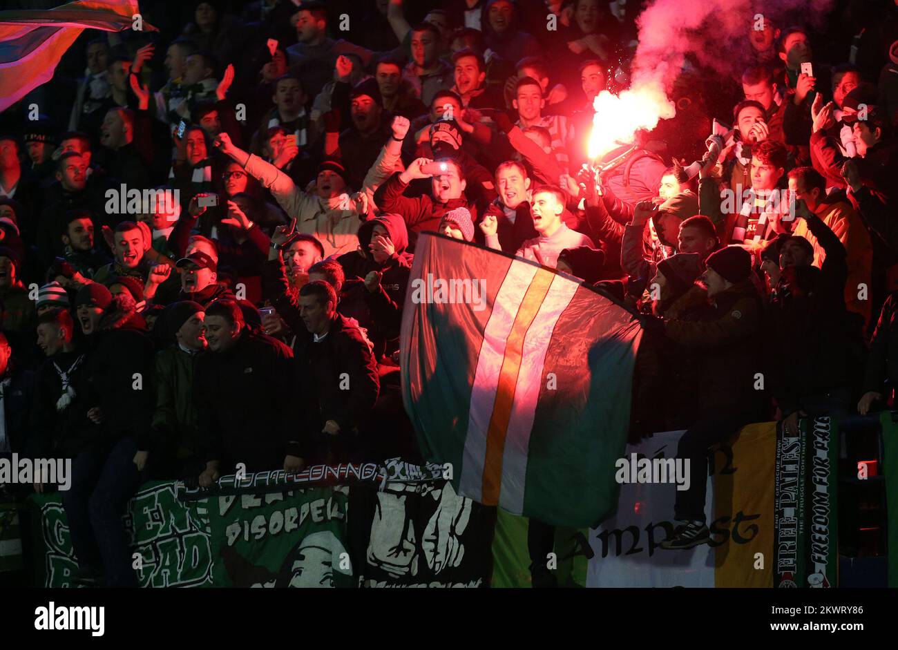 Fans let off flares in the crowd Stock Photo - Alamy