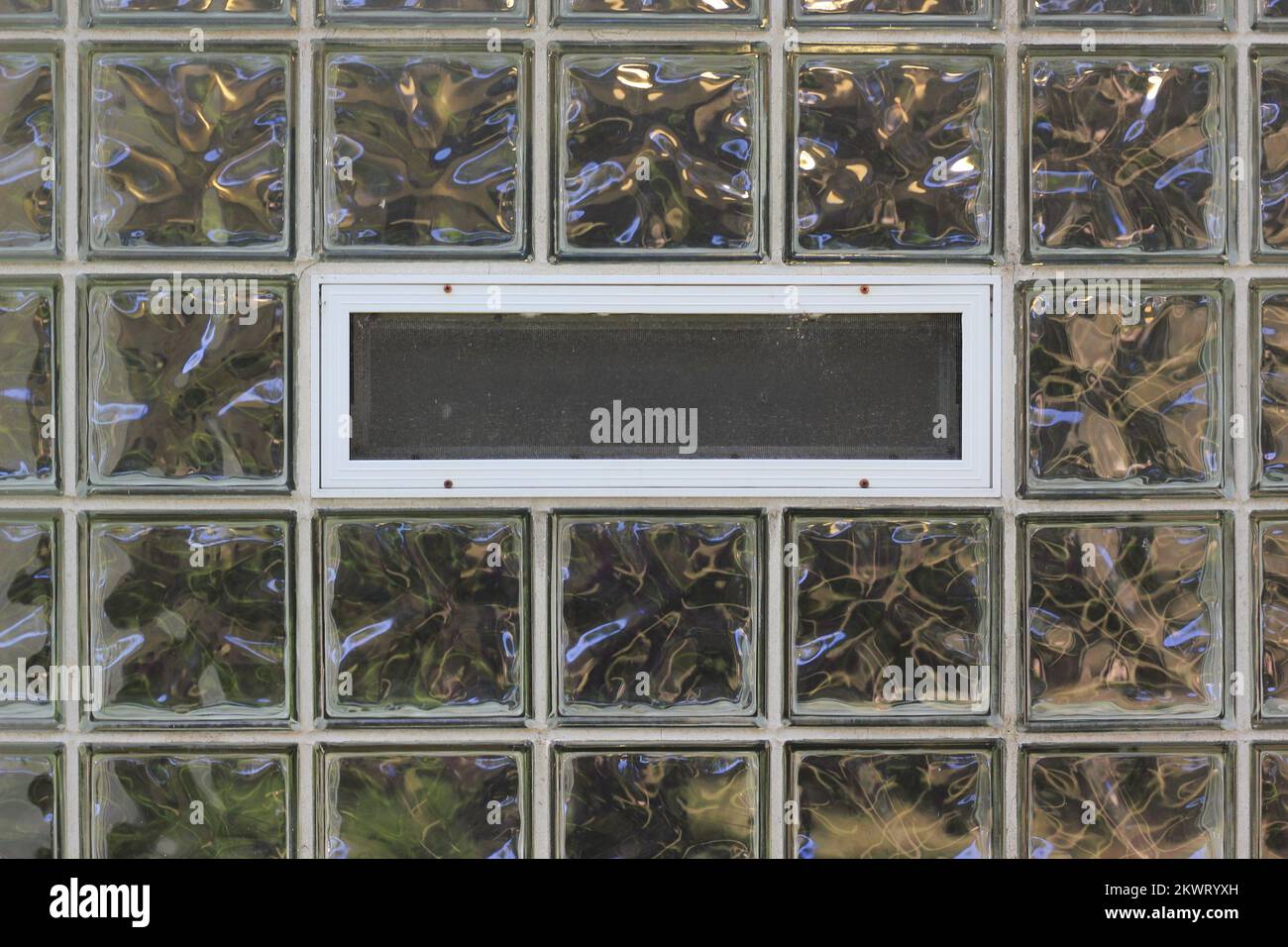 Vintage glass block window with a rectangular screen Stock Photo - Alamy