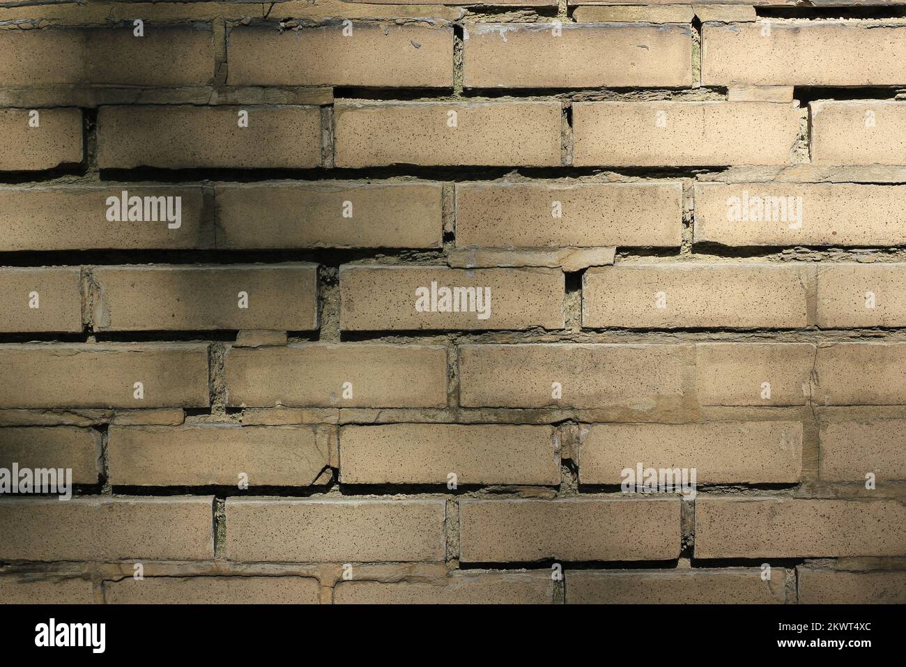 Weathered and worn but typical and common brick wall Stock Photo - Alamy