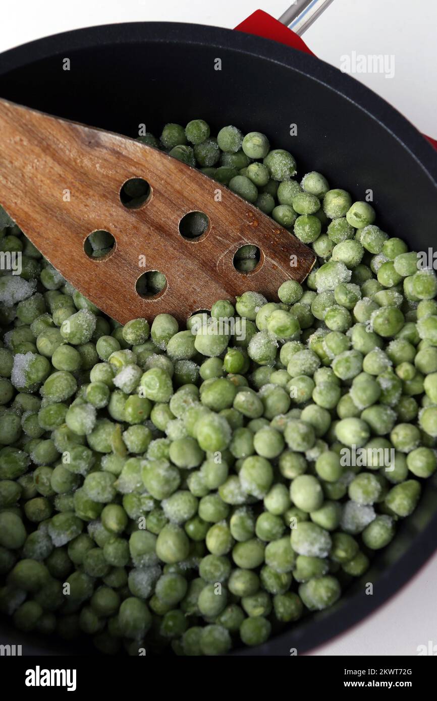 Frozen green peas Stock Photo - Alamy