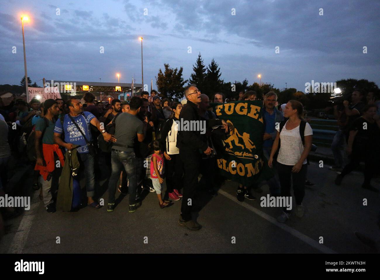 18.09.2015., Croatia, Slovenia,Harmica - The refugees broke through a ...