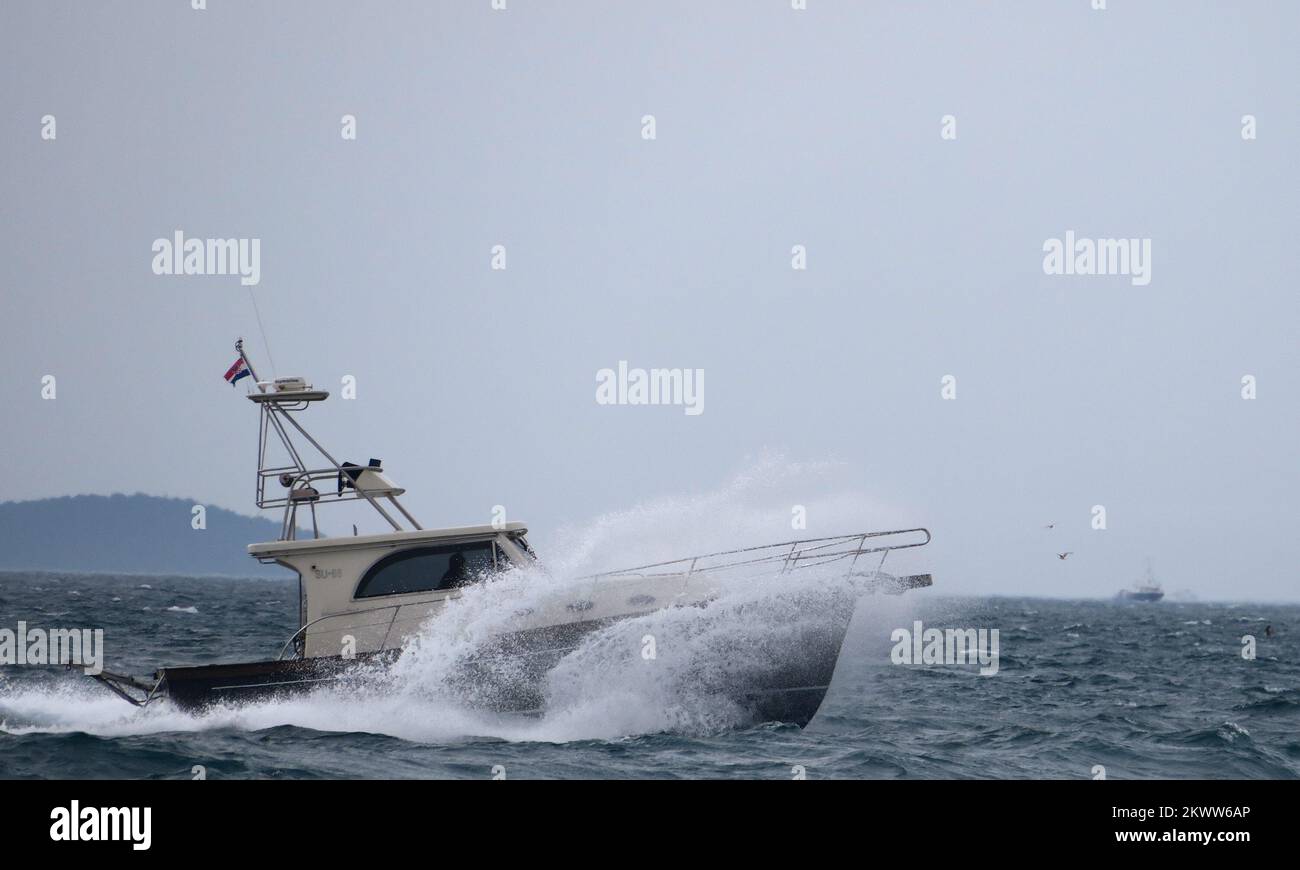 01.04.2016., Split, Croatia - Strong wind rising big waves at the sea ...