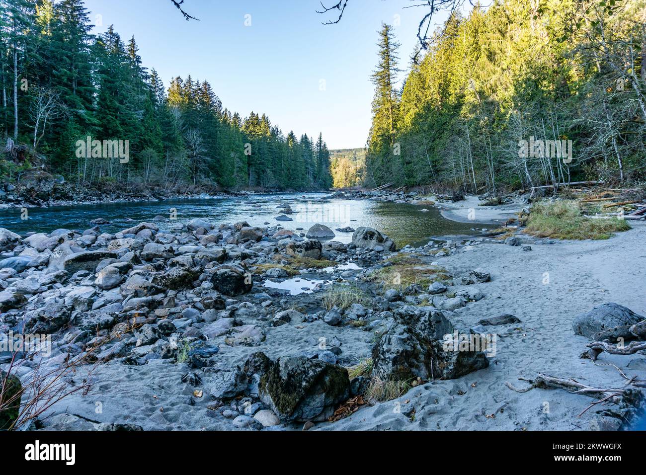 Large rocks line the Snoqaulmie River in Washington State Stock Photo ...