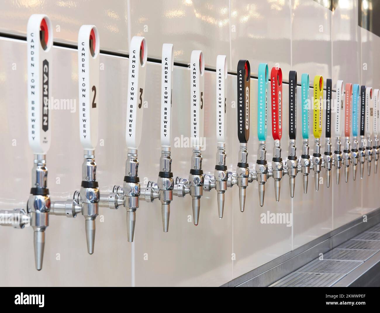 Beer taps fed from brewery directly. Camden Town Beer Hall, London ...