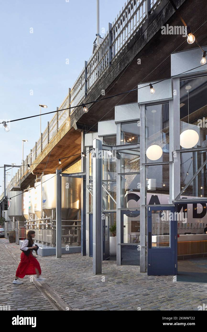 View along facade with beer tanks. Camden Town Beer Hall, London ...