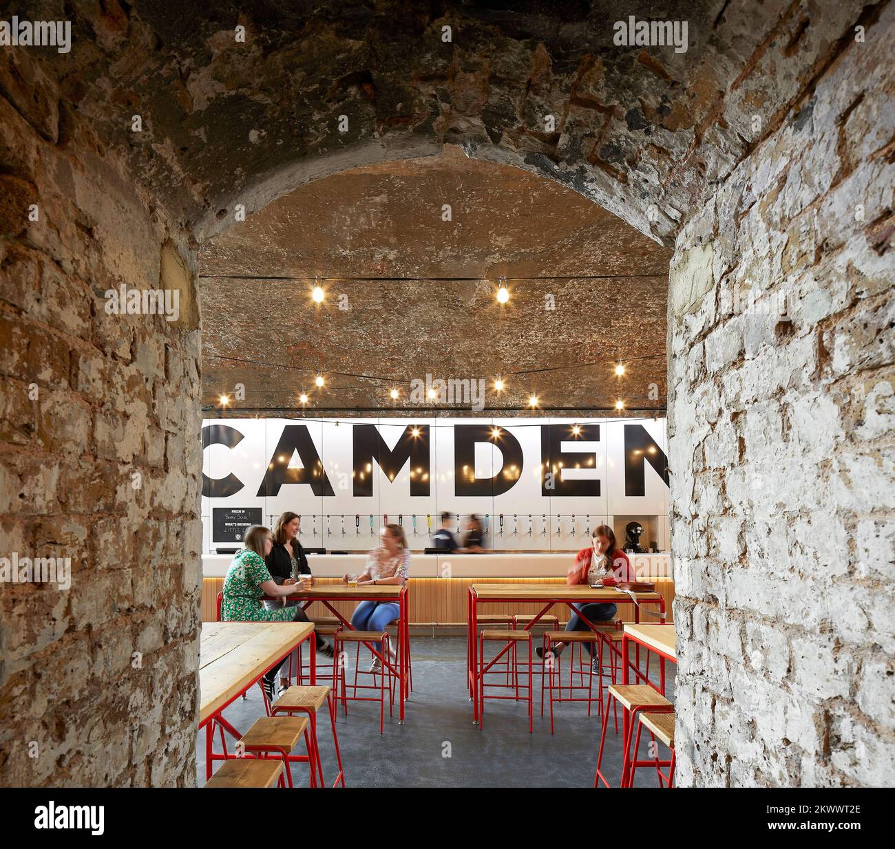 Venue located in old railway arches. Camden Town Beer Hall, London ...