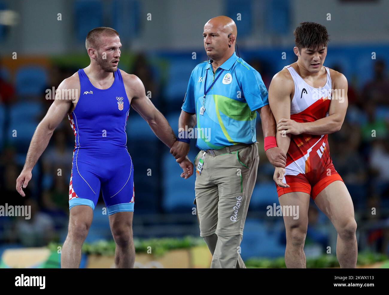 Bozo Starcevic of Croatia competes against Kim Hyeon-Woo of Korea ...