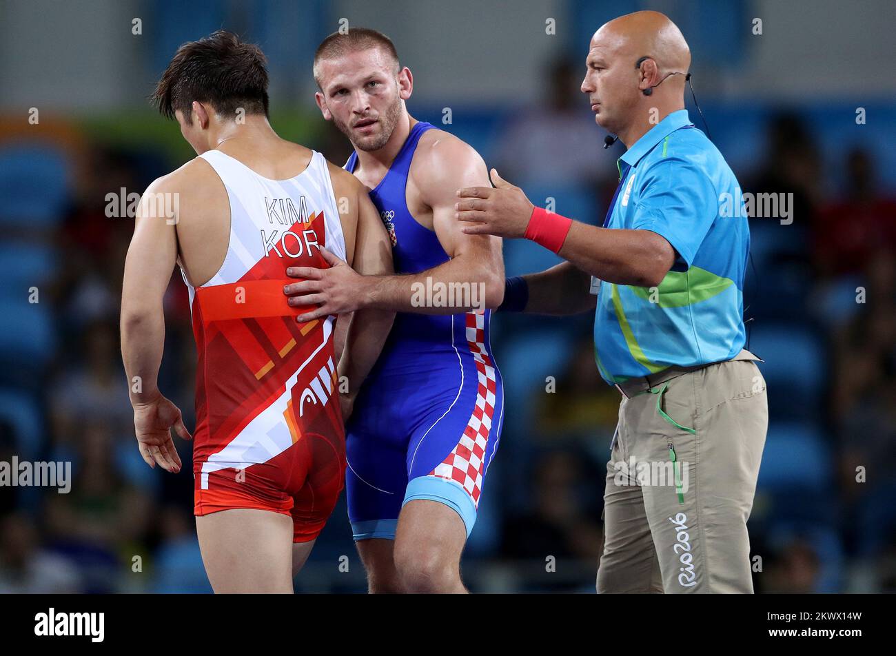 Bozo Starcevic of Croatia competes against Kim Hyeon-Woo of Korea ...