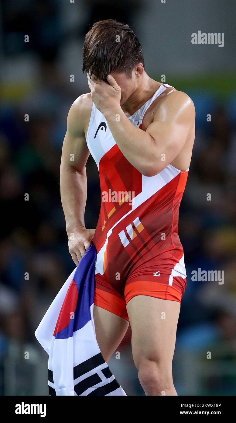 Bozo Starcevic of Croatia competes against Kim Hyeon-Woo of Korea ...