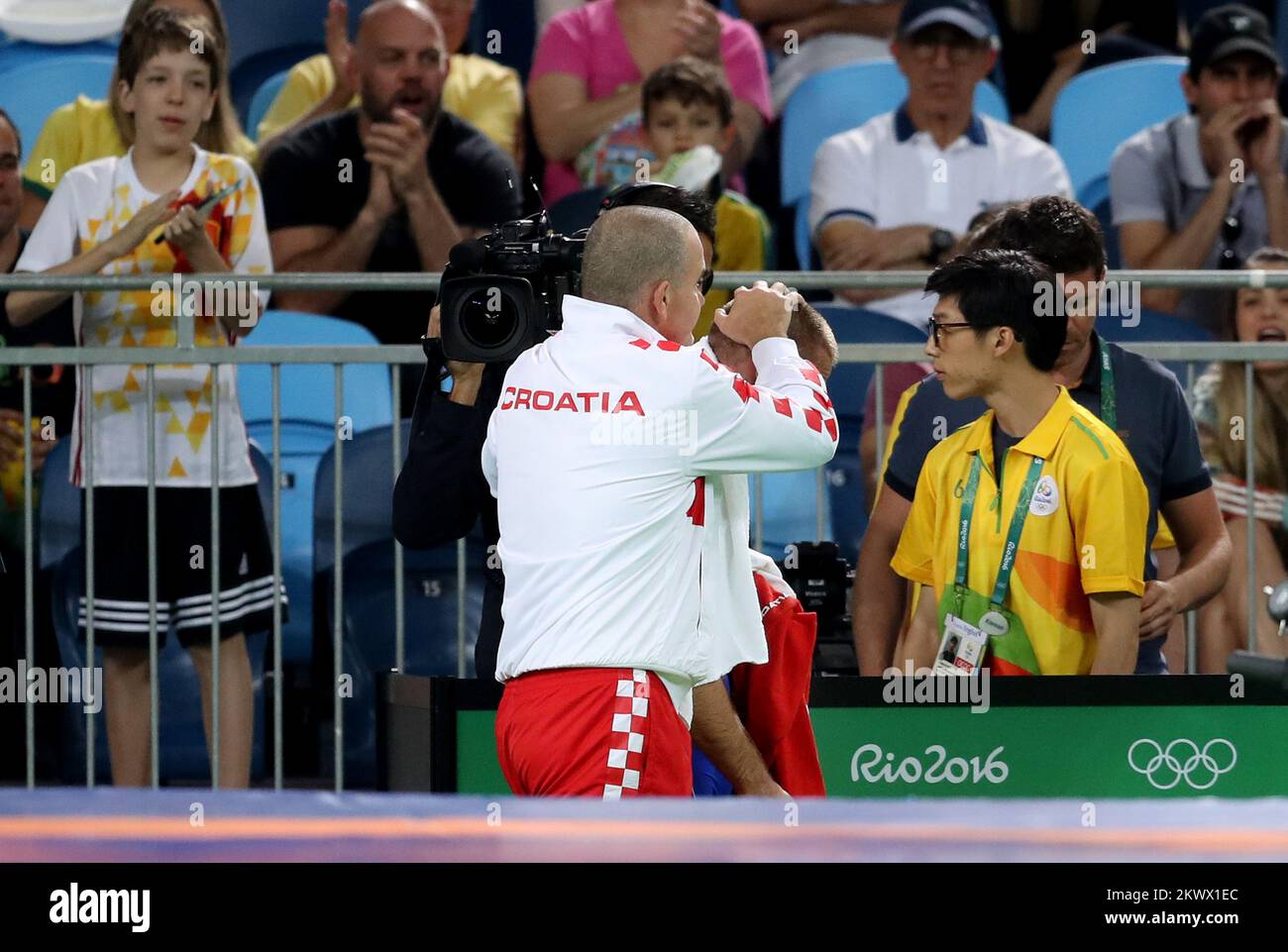 Bozo Starcevic of Croatia competes against Kim Hyeon-Woo of Korea ...